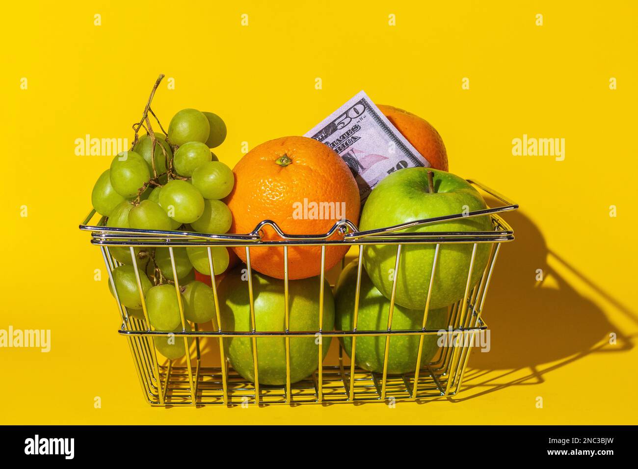 basket cart supermarket with fruit and dollar bill, fruit for food and ...