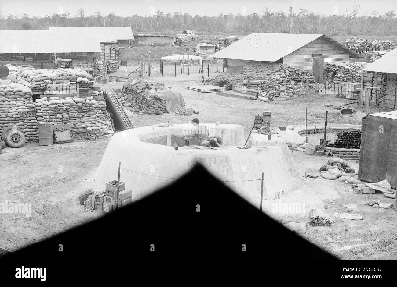 U.S. Special Forces troopers fire a mortar barrage at the North ...