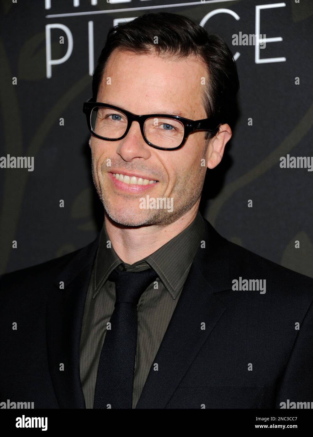 Actor Guy Pearce attends the premiere of HBO's 'Mildred Pierce' at the ...
