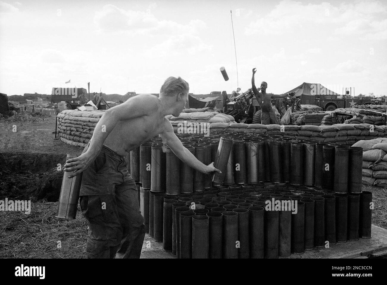Soldier of the U.S. 1st Infantry Division adds spent 105mm howitzer ...