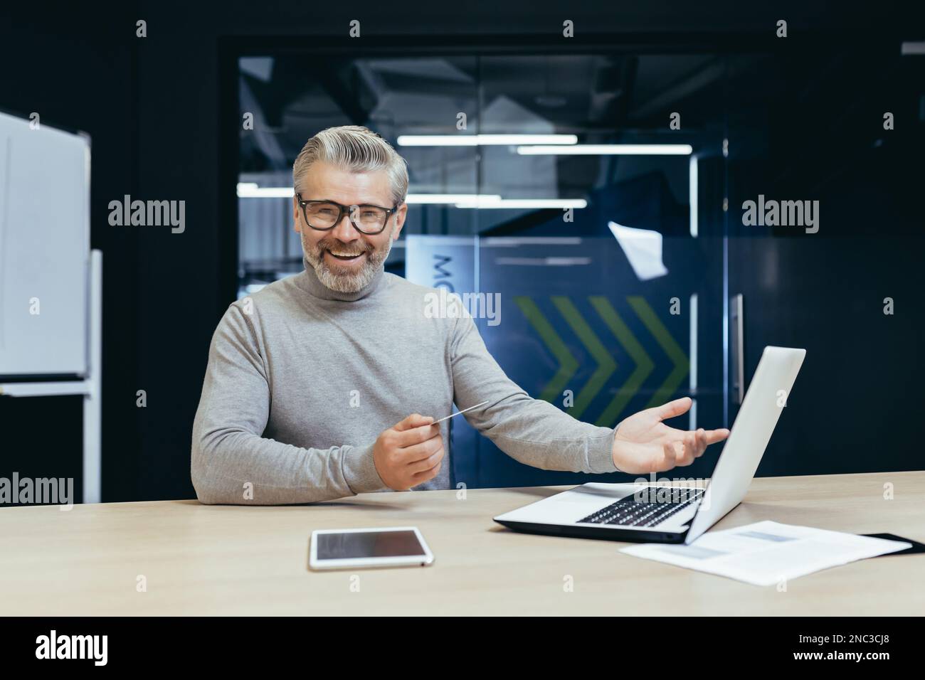 Successful gray haired businessman rejoices and celebrates completion ...