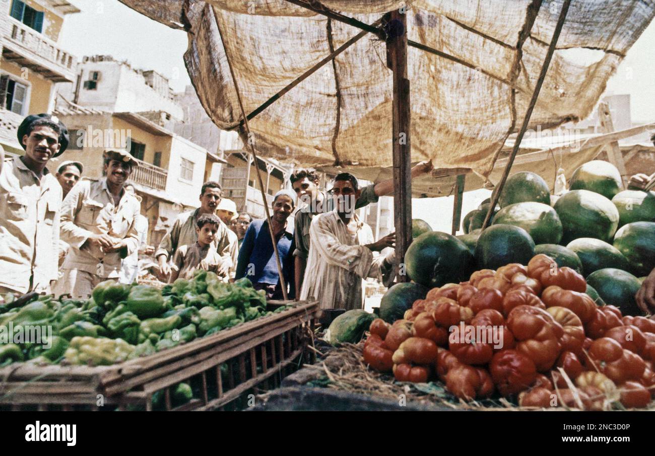 Frontier fruits are dispensed by Ali Mohamed Hussien, with his wares in ...