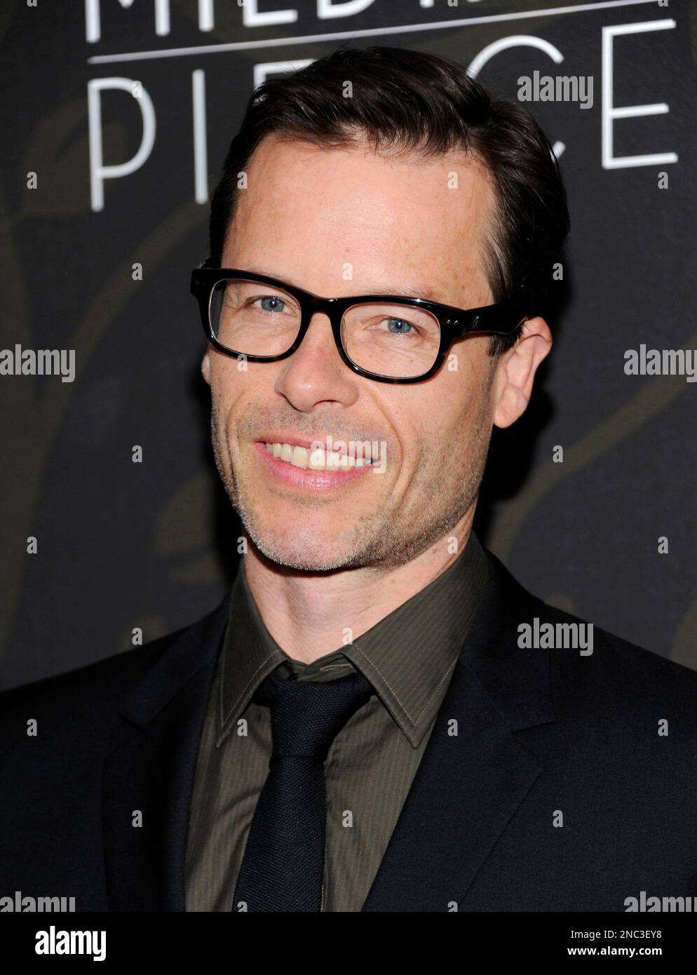 Actor Guy Pearce attends the premiere of HBO's 'Mildred Pierce' at the ...