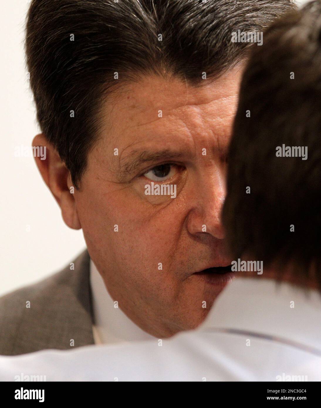 House Speaker Greg Stumbo, D-Prestonsburg, whispers to Rep. Fred Nesler ...
