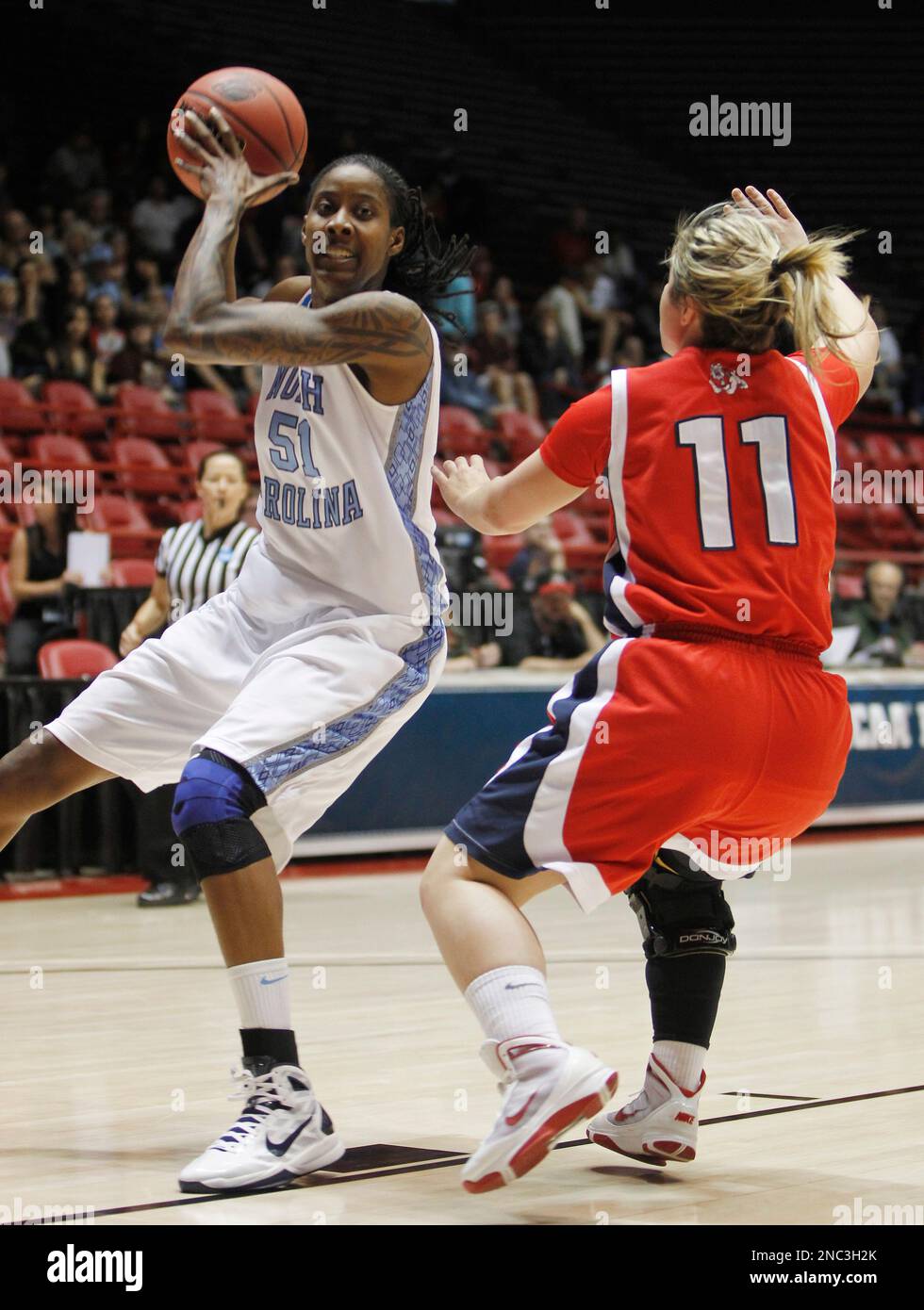 North Carolina's Jessica Breland (51) pulls the ball away from Fresno State's Emma Andrews (11 ...