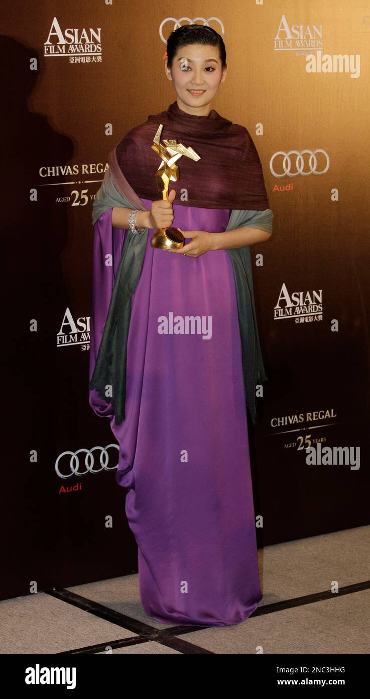 Chinese actress Xu Fan holding the trophy, after winning the best ...