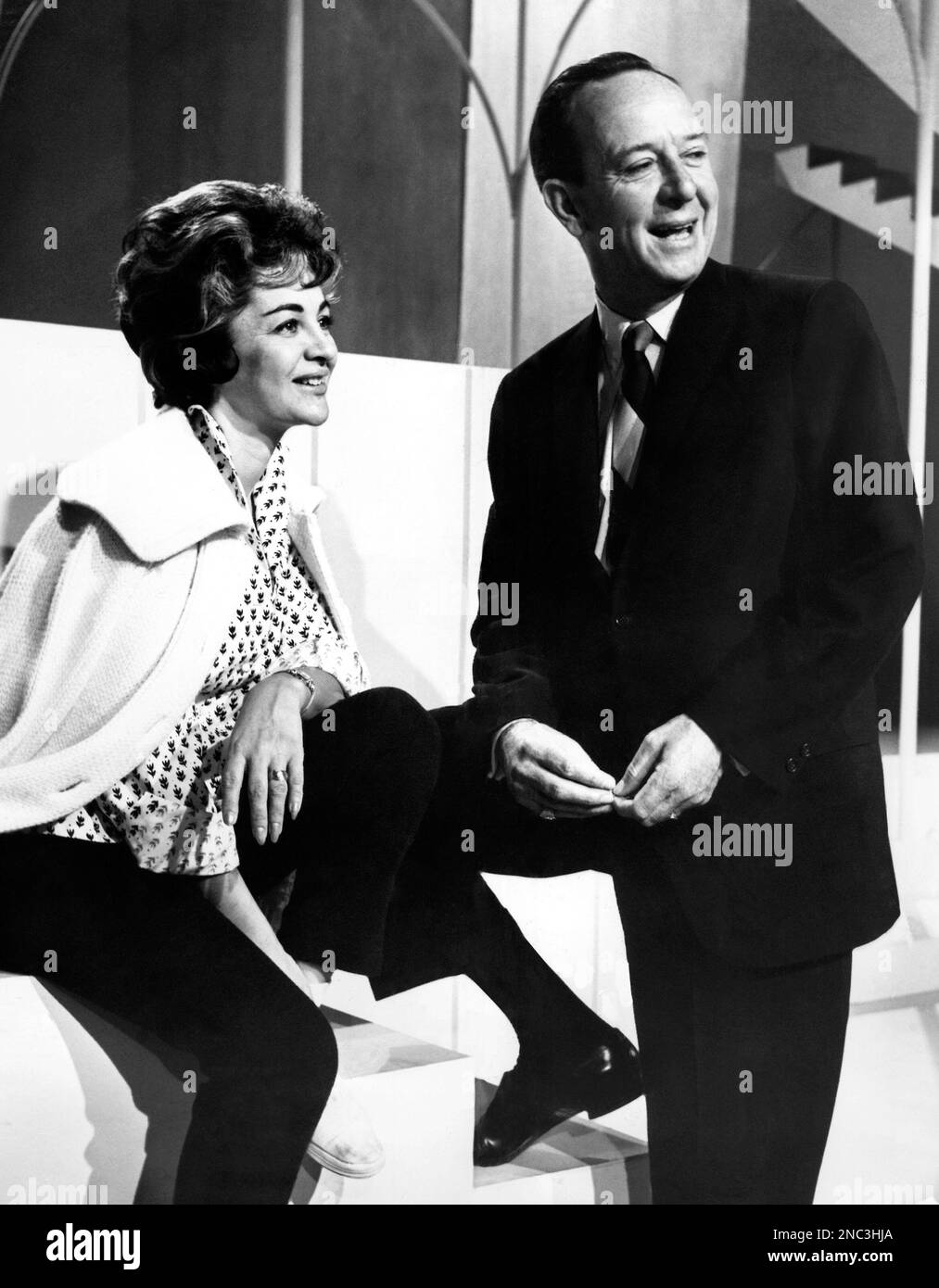 Gogi Grant and John Daly await their turn to appear before the camera ...