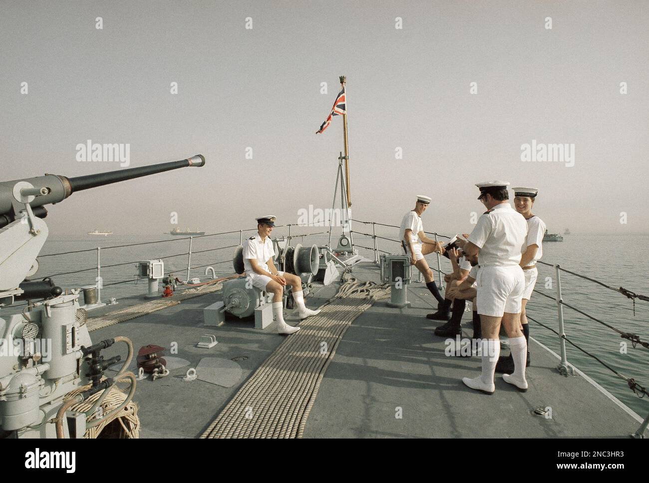British sailors aboard HMS Gavinton in the Gulf of Suez outside Suez ...