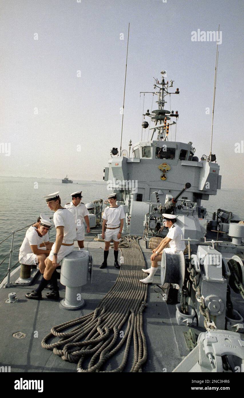 British sailors aboard HMS Gavinton in the Gulf of Suez outside Suez ...