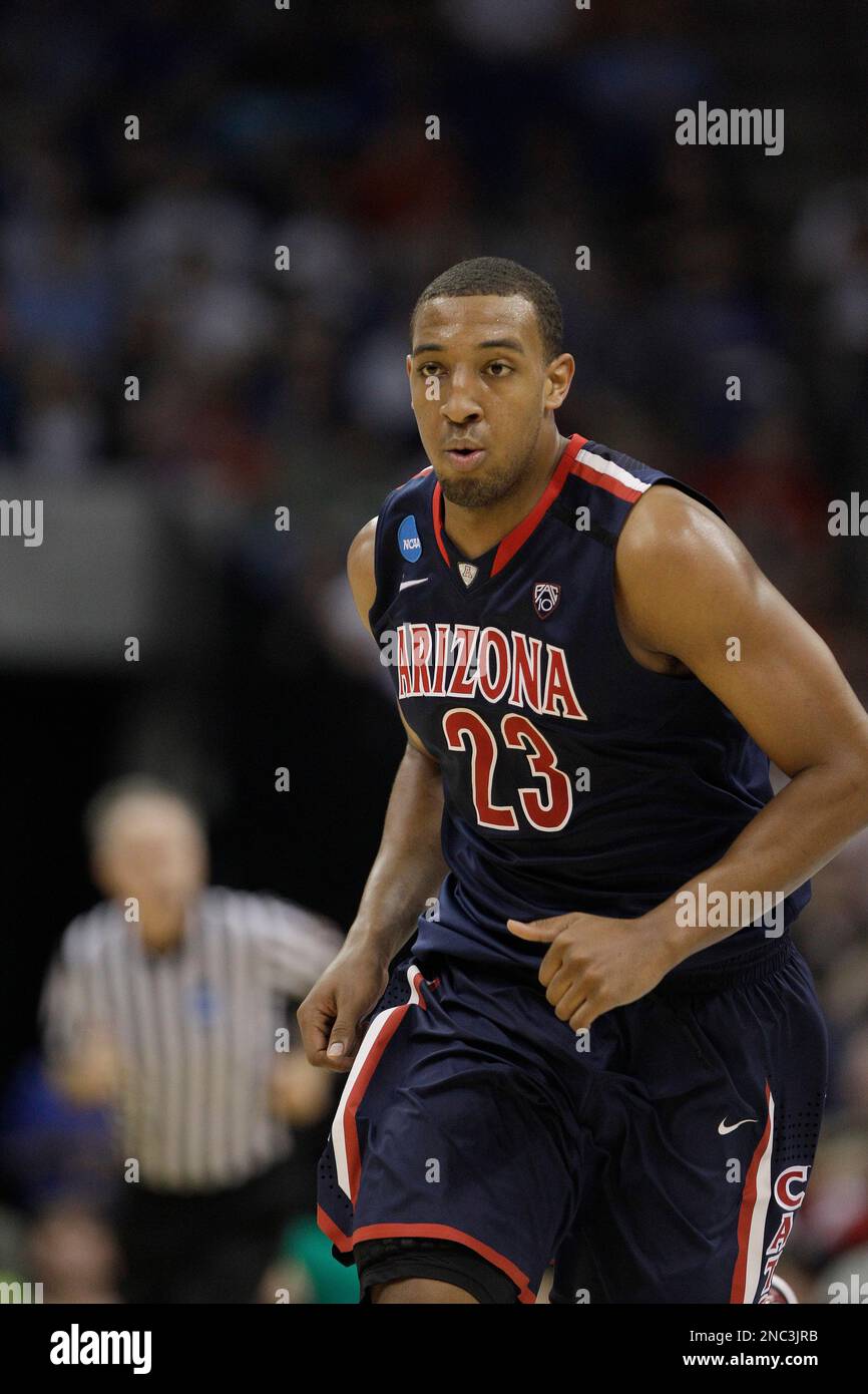 Arizona's Derrick Williams runs down court during the second half of a ...