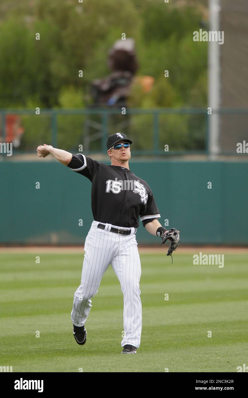 Chicago White Sox's Gordon Beckham throws before the White Sox's spring ...