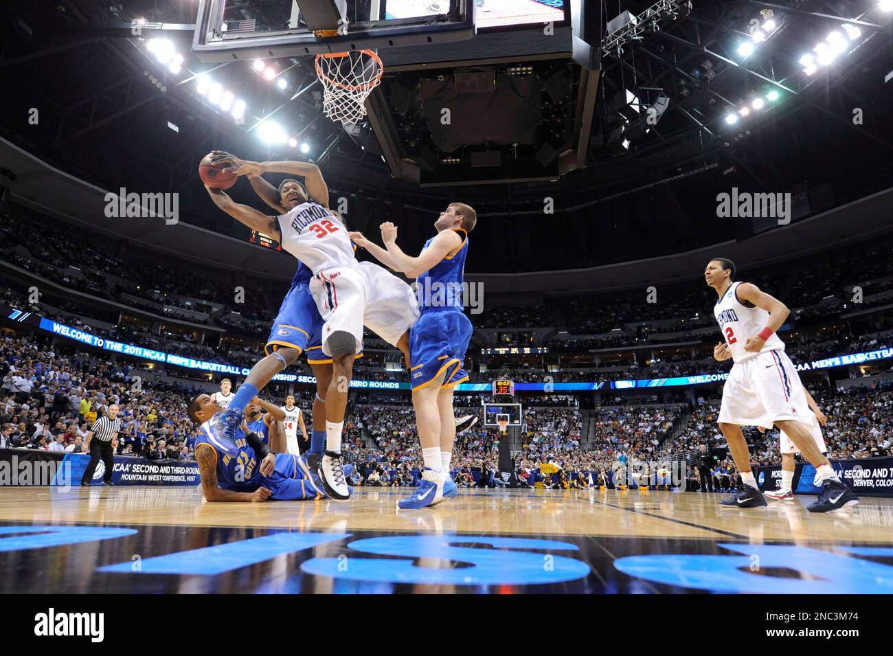 Richmond forward Justin Harper (32) and Morehead State forward Drew ...