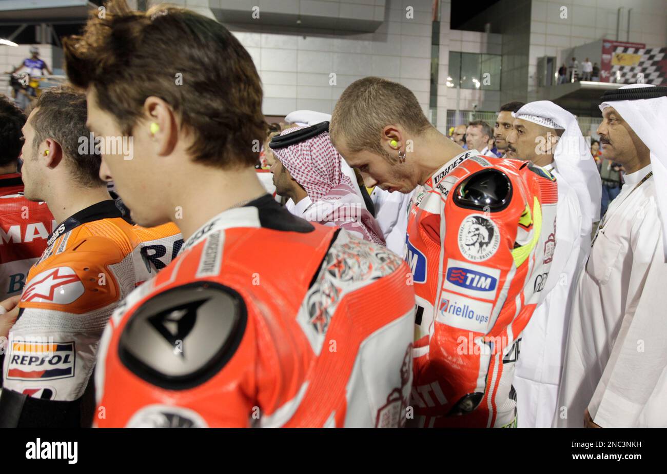 MotoGP Ducati rider Valentino Rossi of Italy, center, and MotoGP Ducati ...