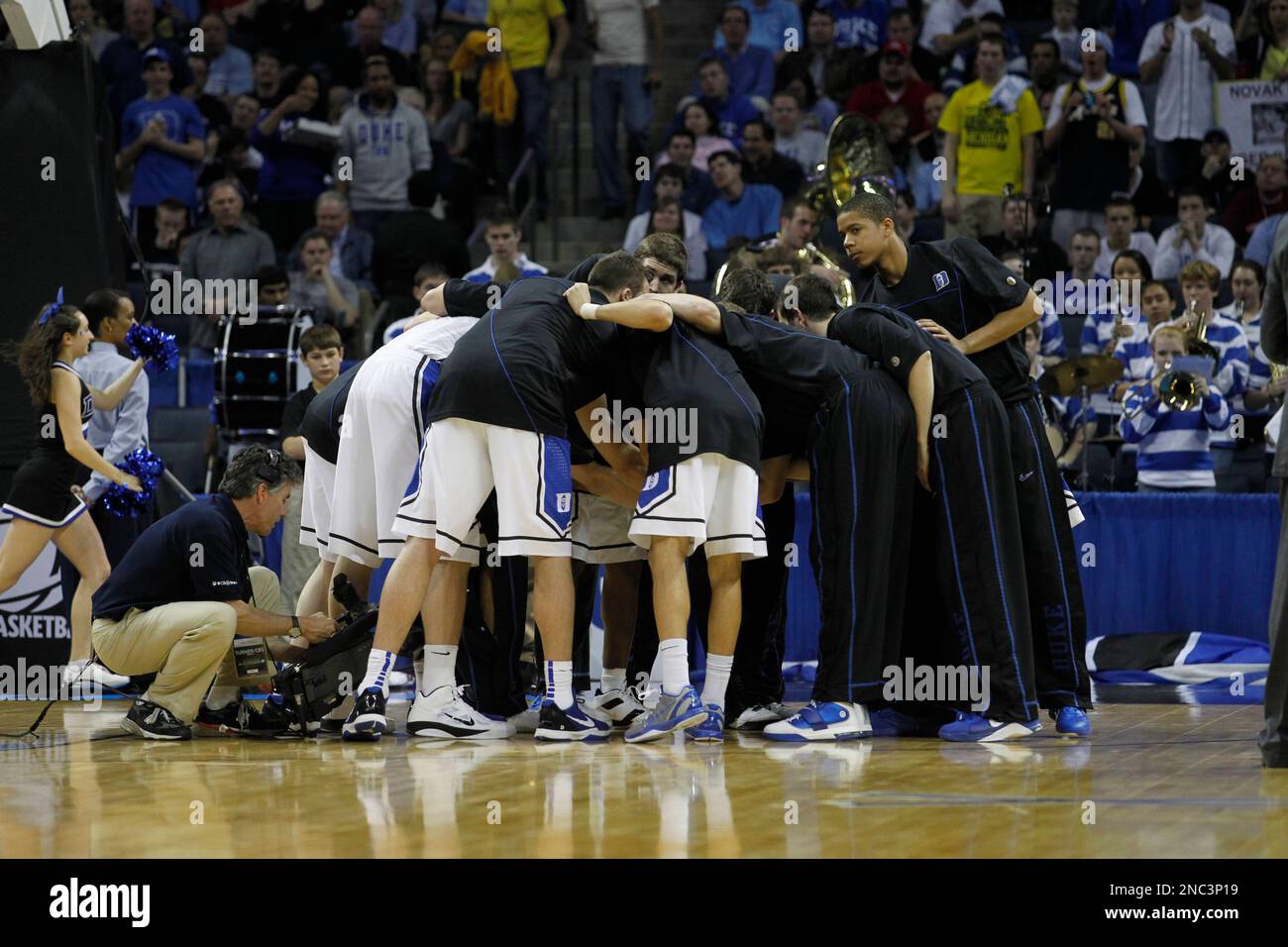 Duke players huddle before in the first half of a West Regional NCAA ...