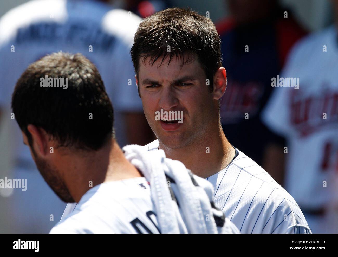 Minnesota Twins Joe Mauer talk with pitcher Nick Blackburn at a spring ...
