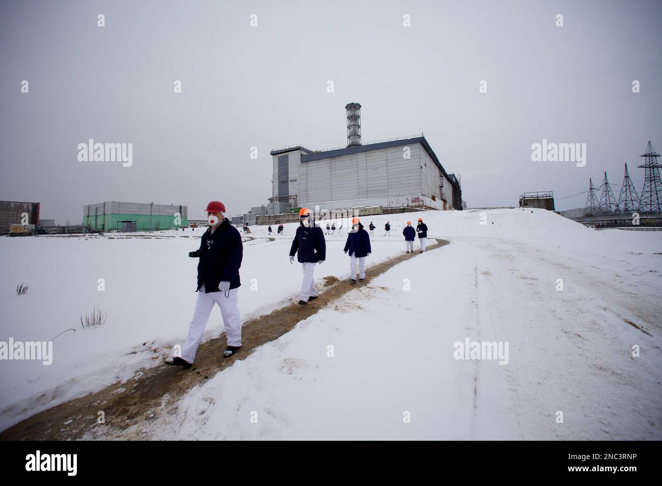 In this Thursday Feb. 24, 2011 picture workers and visitors walk in ...