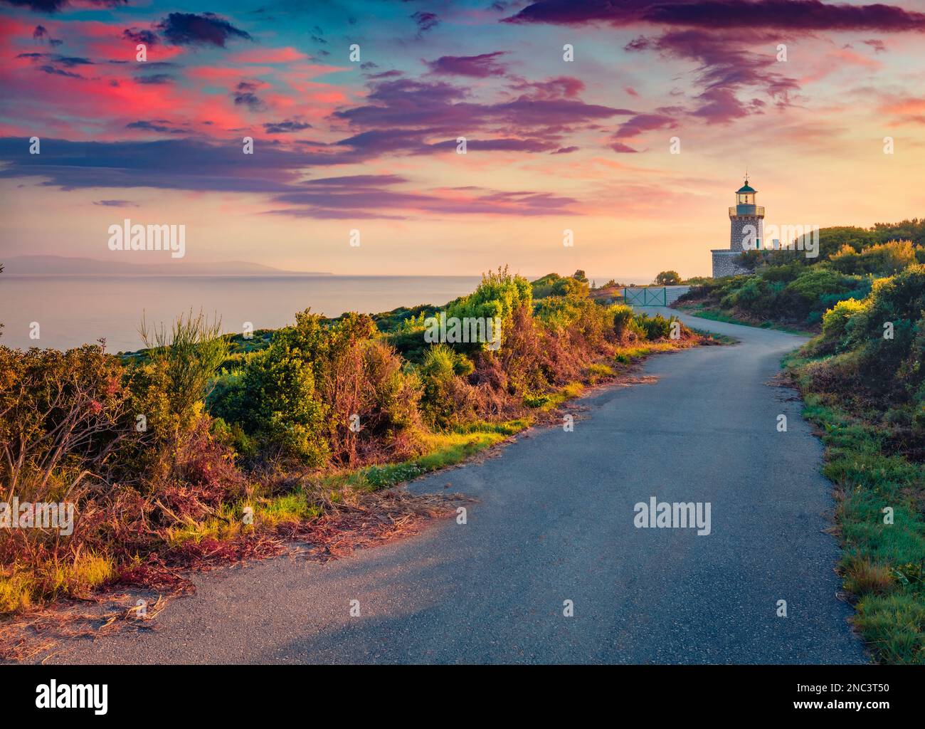 Beautiful morning view of Skinari Lighthouse. Amazing summer sunrise on ...