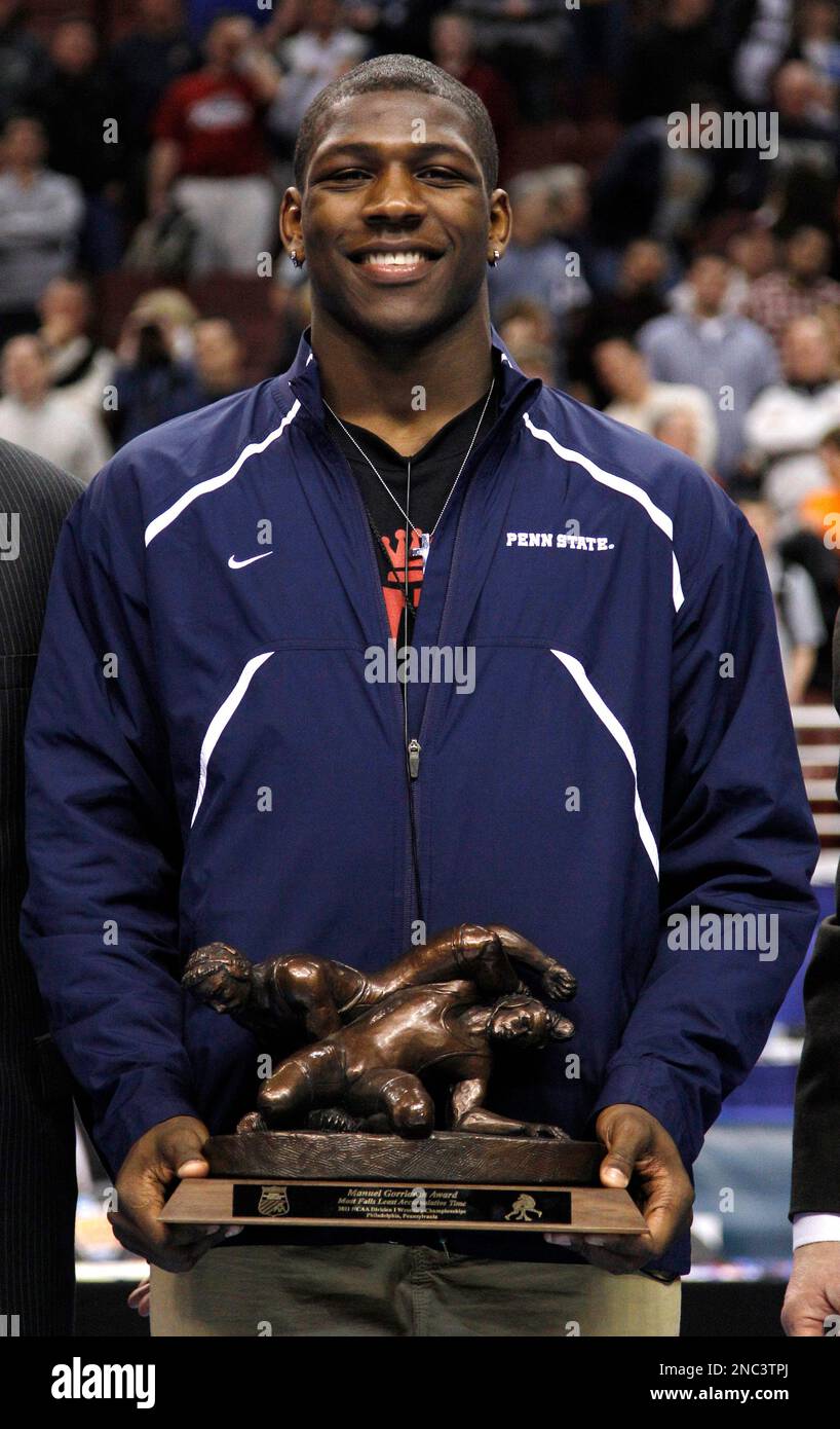 Penn State's Edward Ruth poses with the Manuel Gorriaran Award for most ...