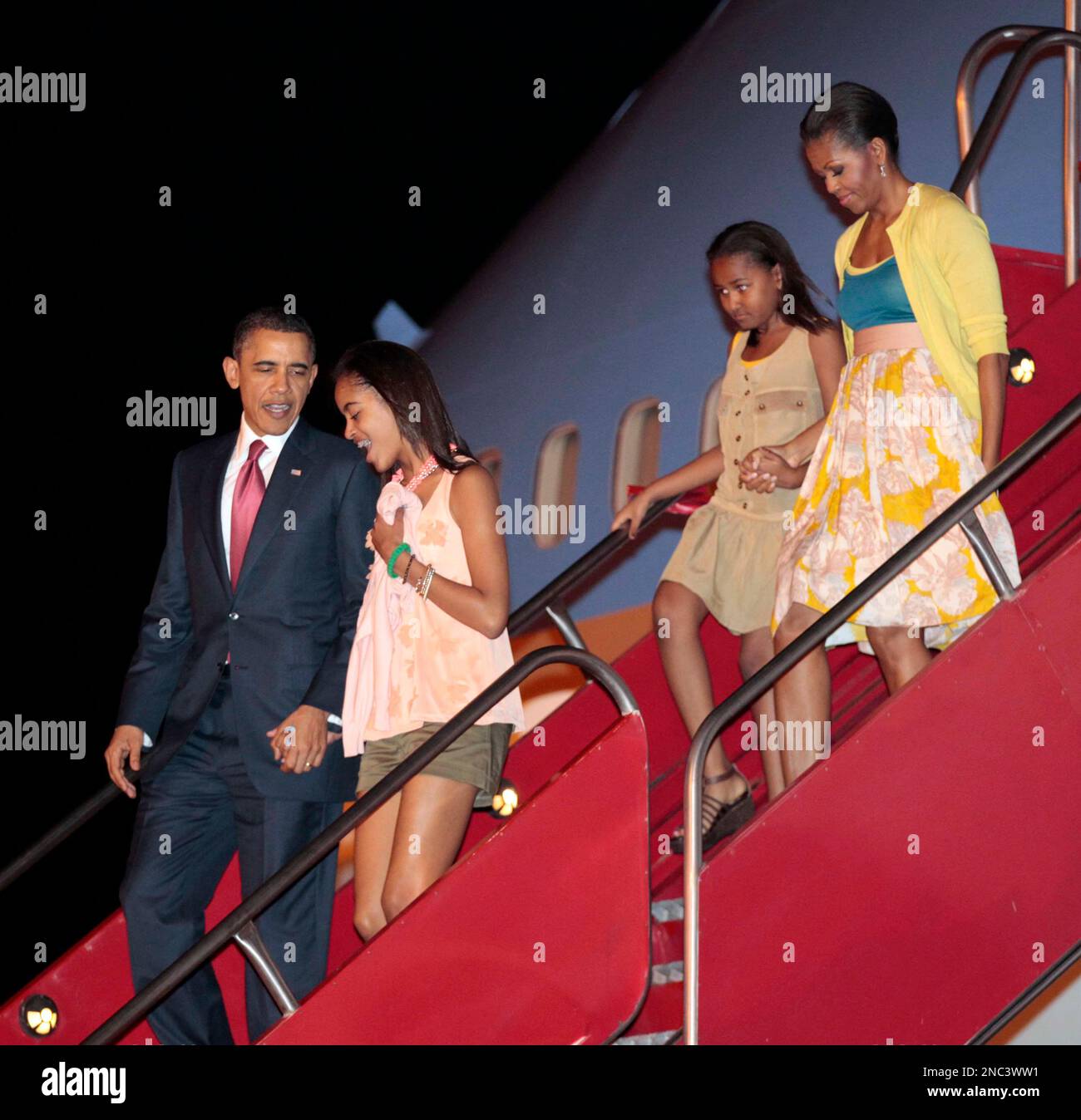 President Barack Obama with first lady Michelle Obama and daughters ...