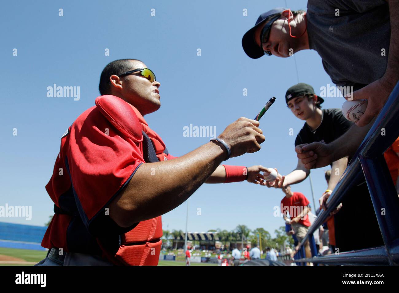Washington Nationals catcher Ivan Rodriguez (7) signs autographs before ...