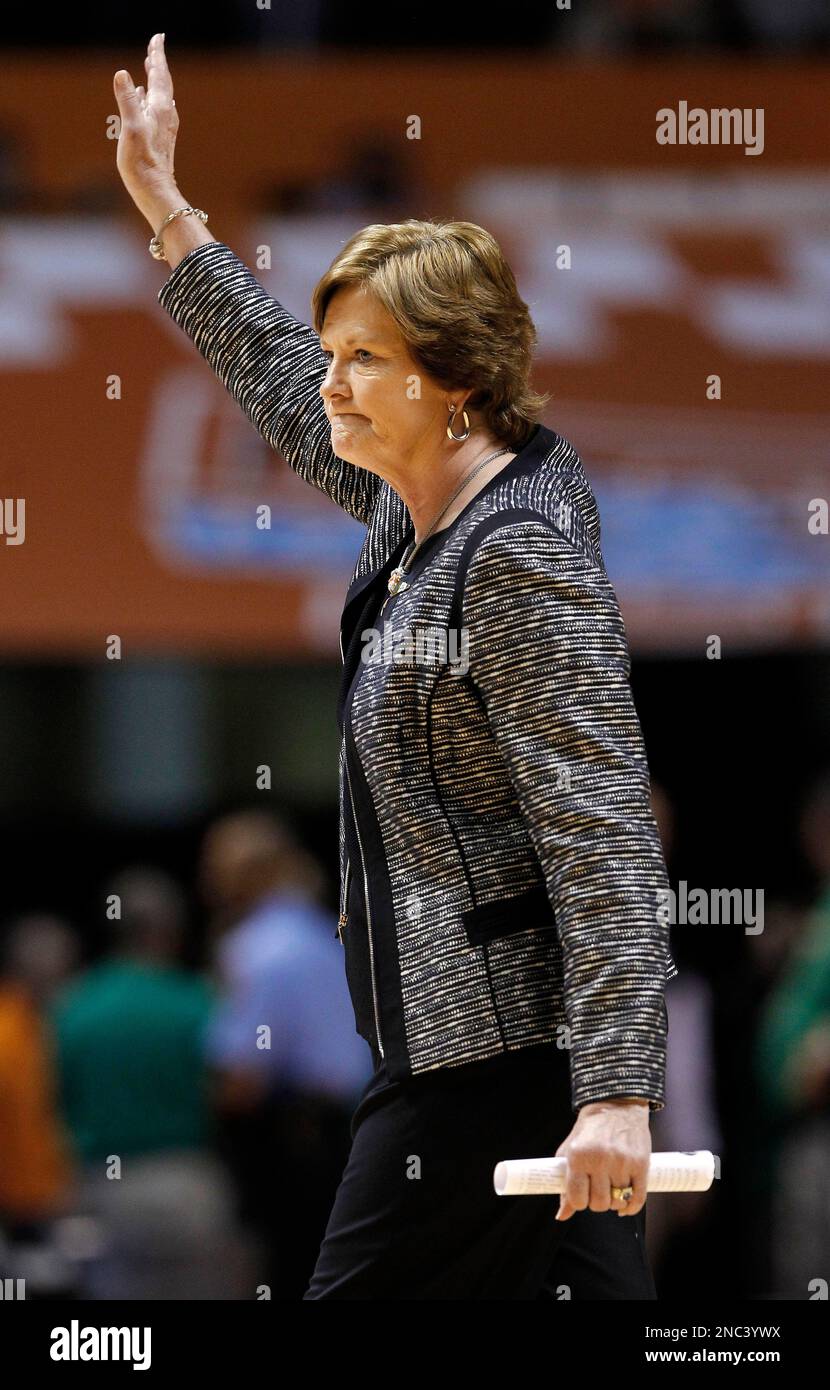 Tennessee head coach Pat Summitt waves to the fans as she leaves the ...