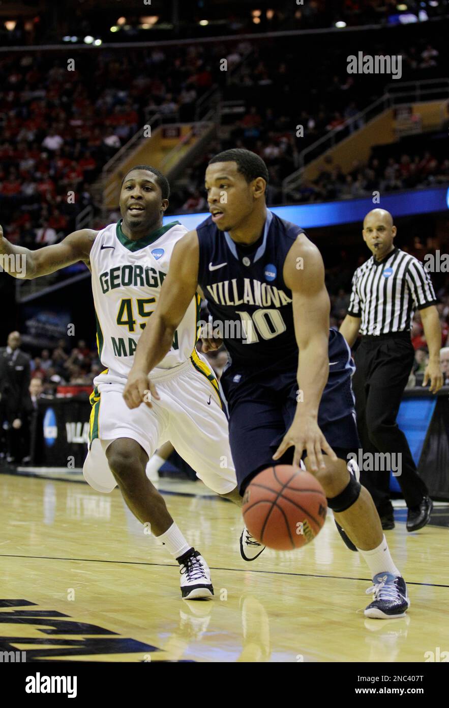 Villanova's Corey Fisher (10) drives past George Mason's Andre ...