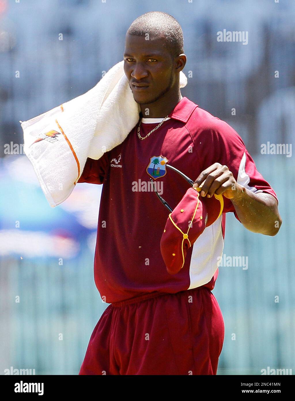 West Indies' captain Darren Sammy cools off during a training session ...