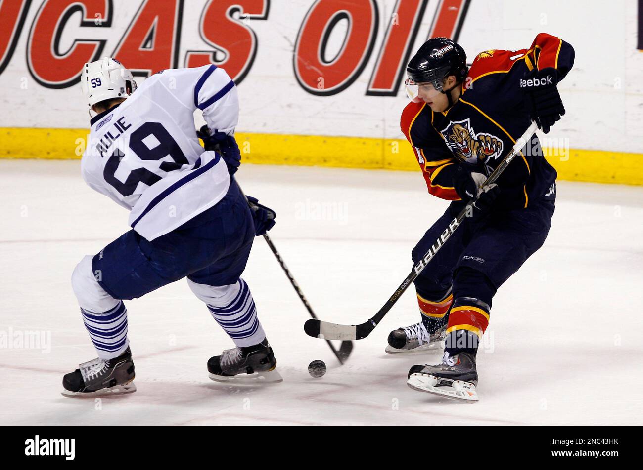 Toronto Maple Leafs' Keith Aulie (59) battles Florida Panthers' Mike ...