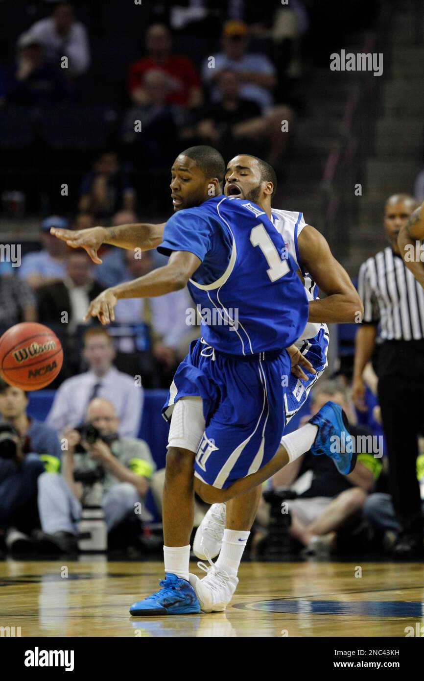 Hampton guard Mike Tuitt (11) runs for a loose ball against Duke in the ...