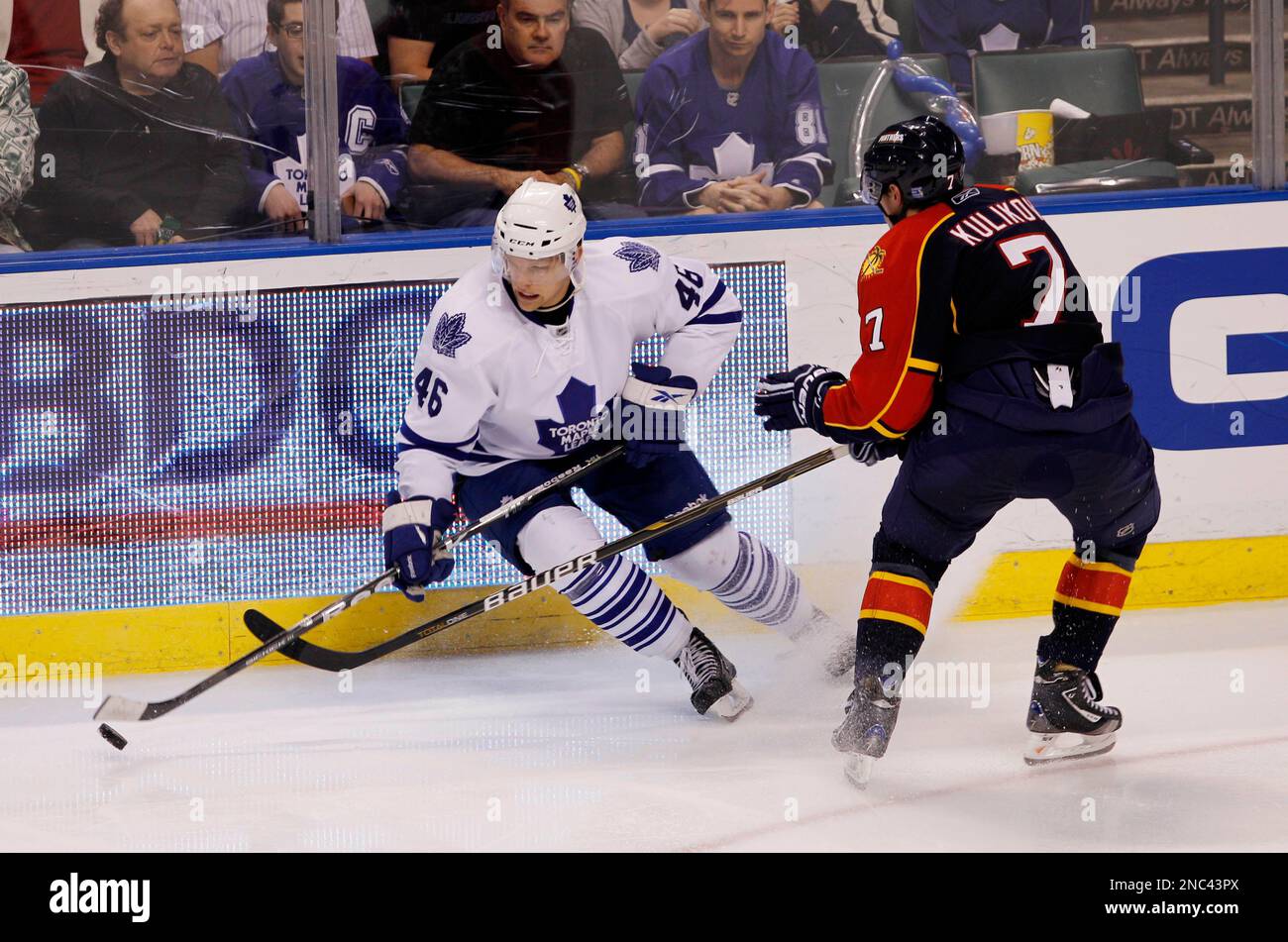 Toronto Maple Leafs' Joey Crabb (46) drives as Florida Panthers' Dmitry ...