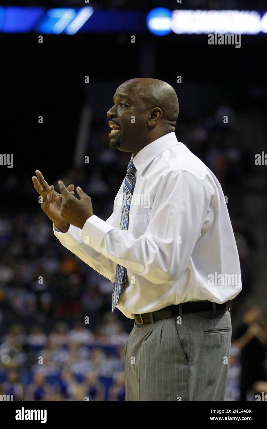 Hampton head coach Edward Joyner, Jr. speaks to players against Duke in ...