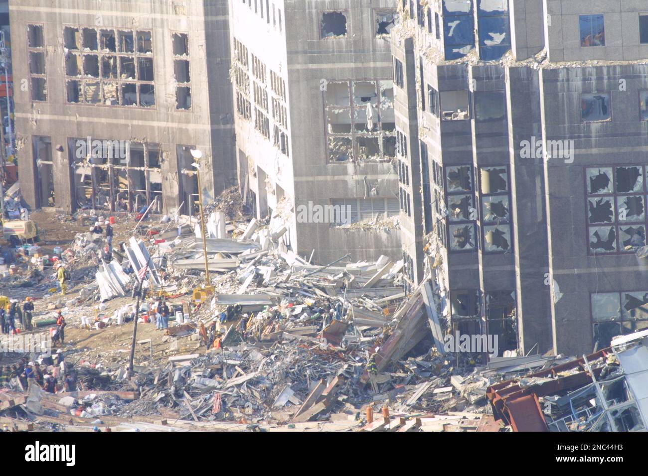 Workers clean up rubble on September 15, 2001 at ground zero after the ...