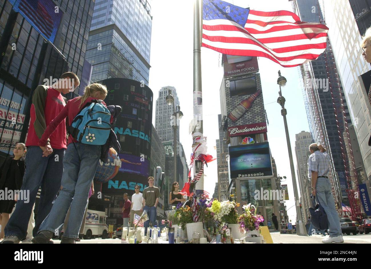 A flag flies at half-mast on September 18, 2001 after the September 11 ...