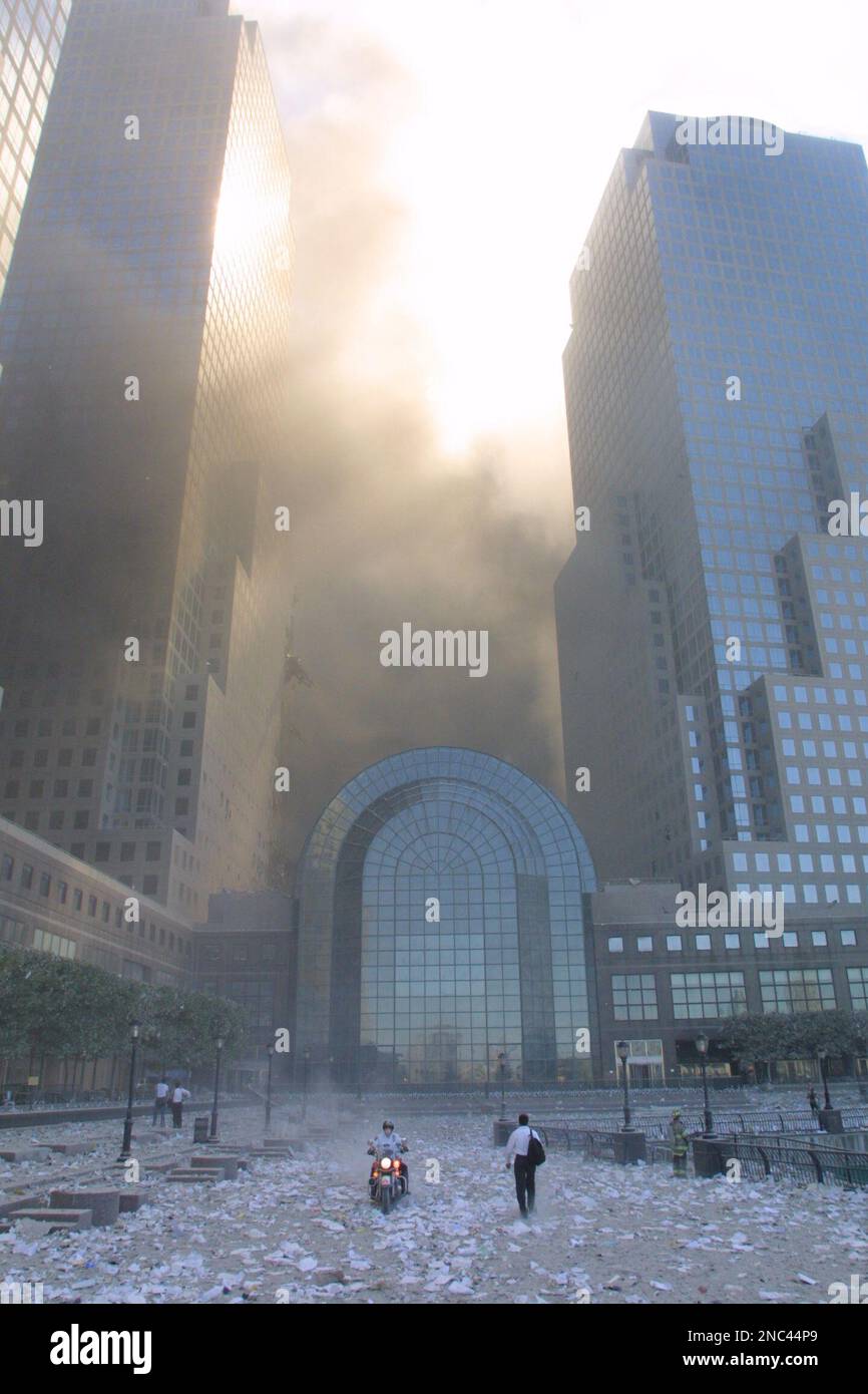 Smoke rises from ground zero after the fall of the twin towers on ...