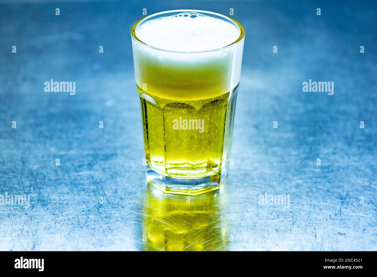 Glass of beer on metallic background. Alcoholic drink Stock Photo - Alamy