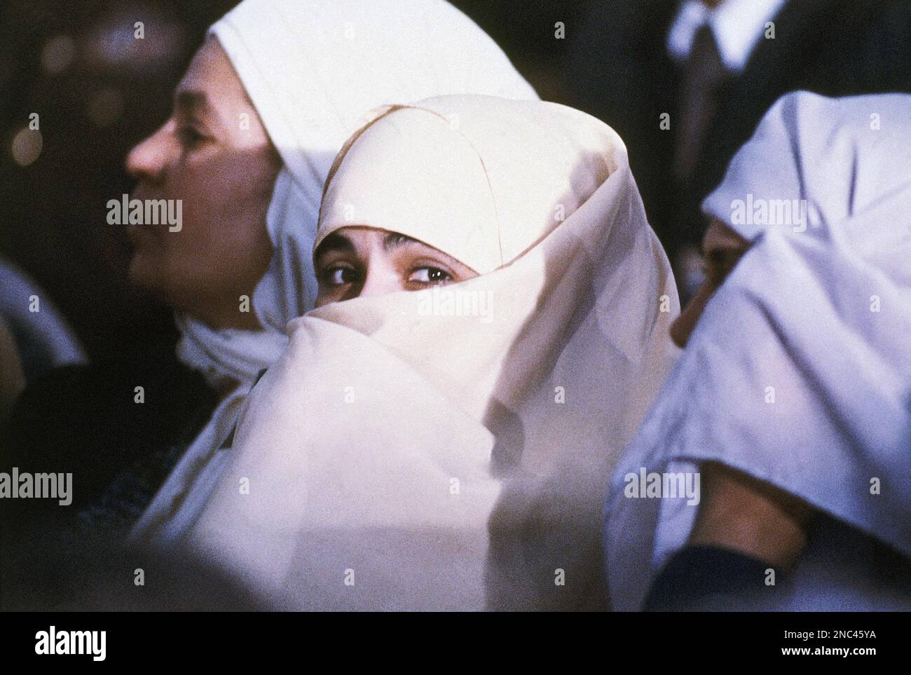 Some women spectators at the trial of 24 members of a Muslim extremist ...