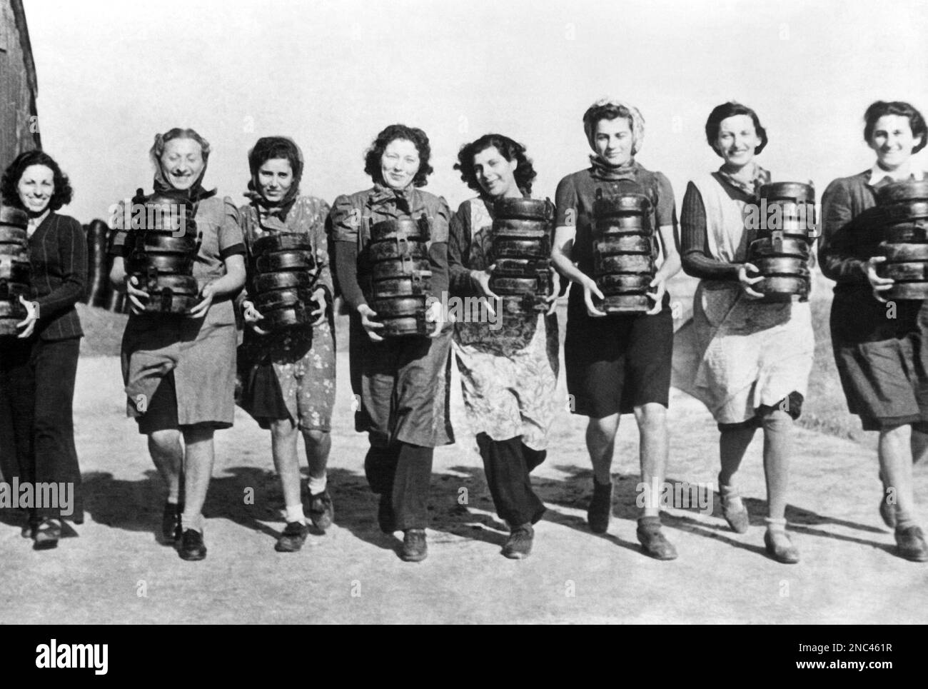 These eight smiling counterparts of American W.O.W.s (Women Ordnance ...