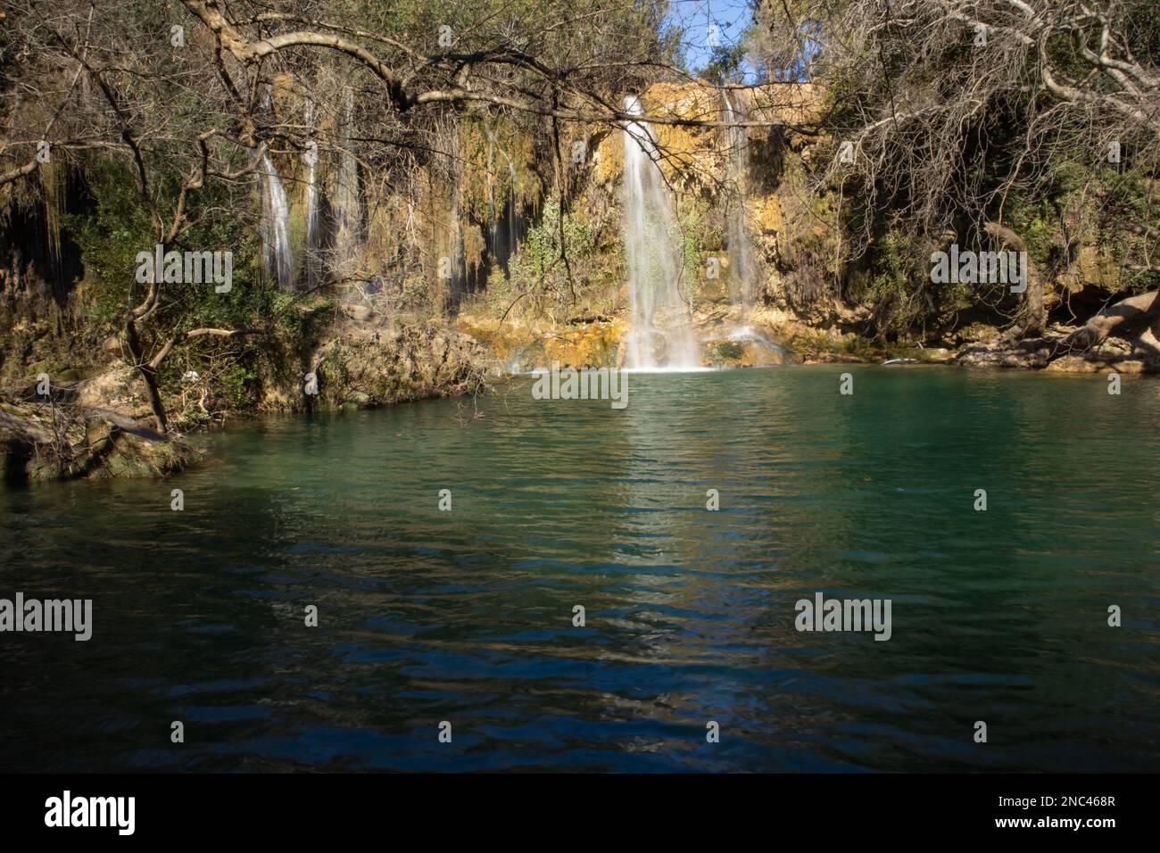 View of a mountain lake and waterfall Stock Photo - Alamy