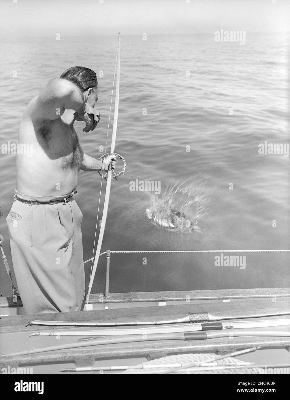 There’s quite a trick about shooting a fish with a bow and arrow, a ...