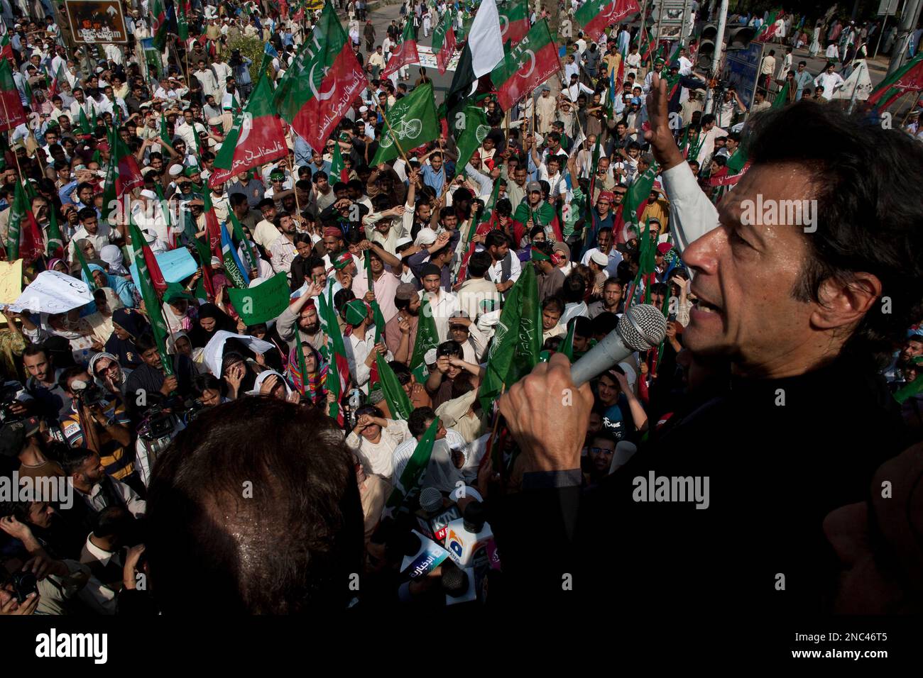Pakistani cricket legend-turn politician Imran Khan addresses a rally ...