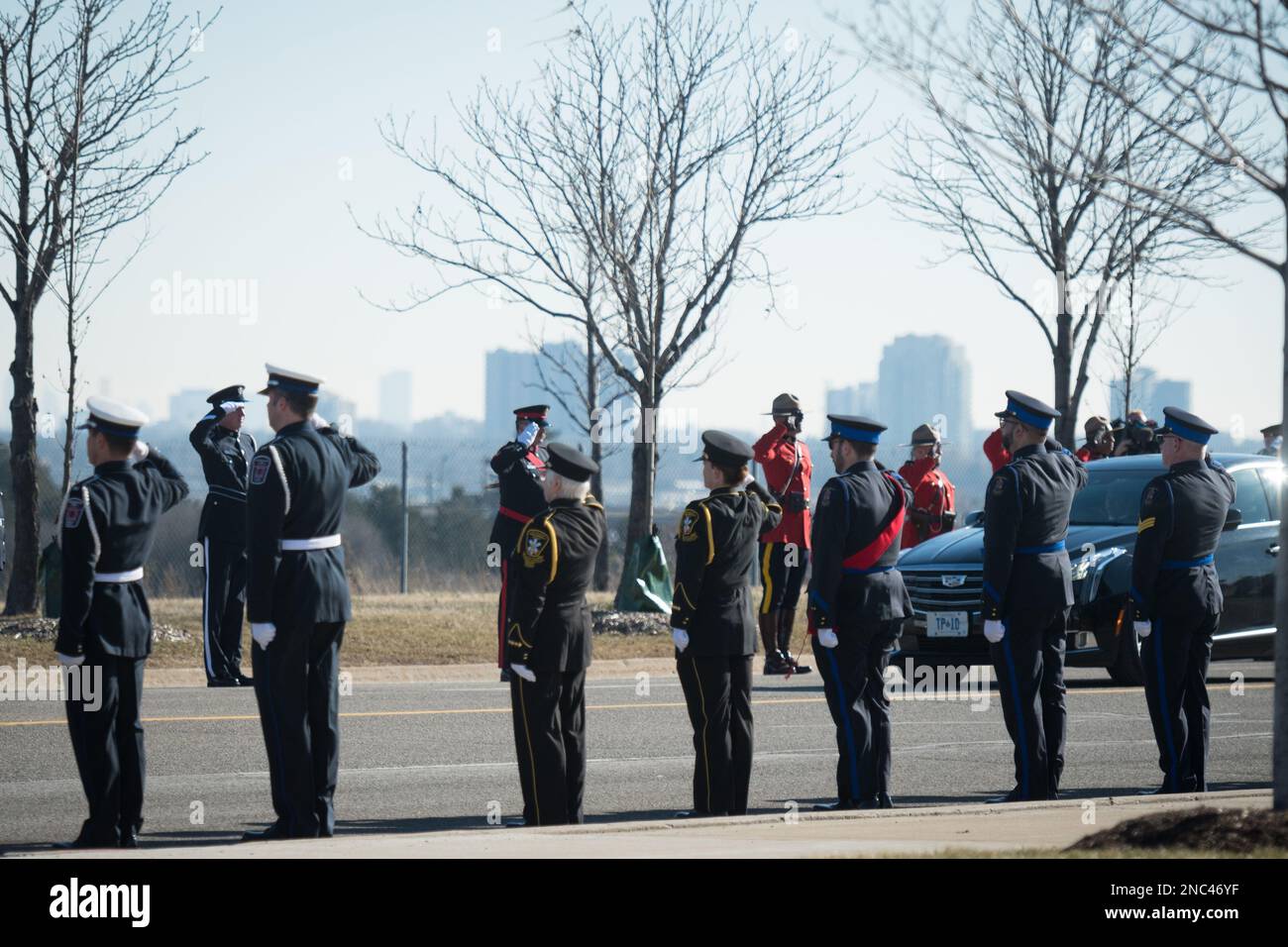 The motorcade drives past the procession during the state funeral for ...
