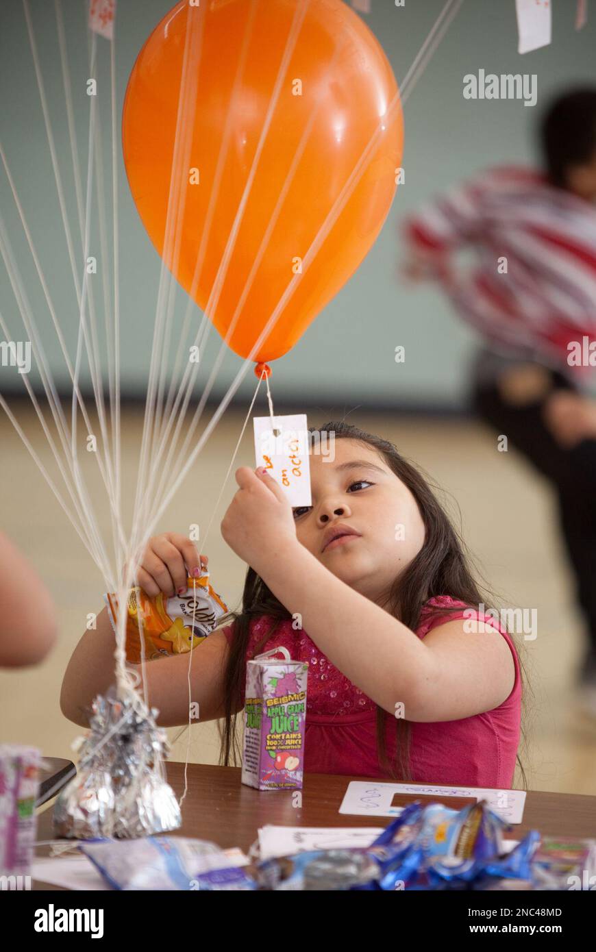 Joanna Silva attaches a card with one of his dreams written on it at ...