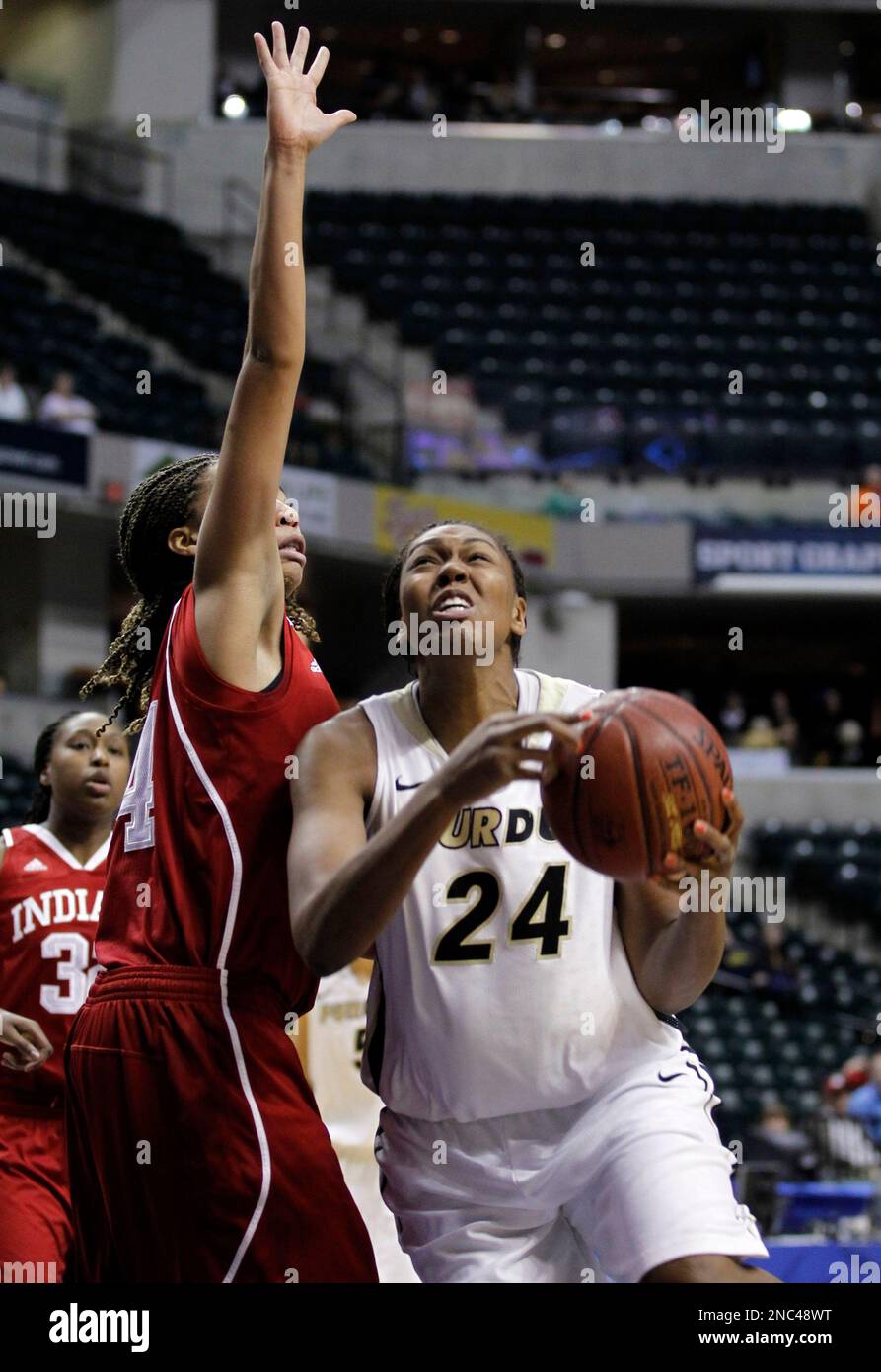 In this March 3, 2011, photo, Purdue forward Drey Mingo, right, shoots ...