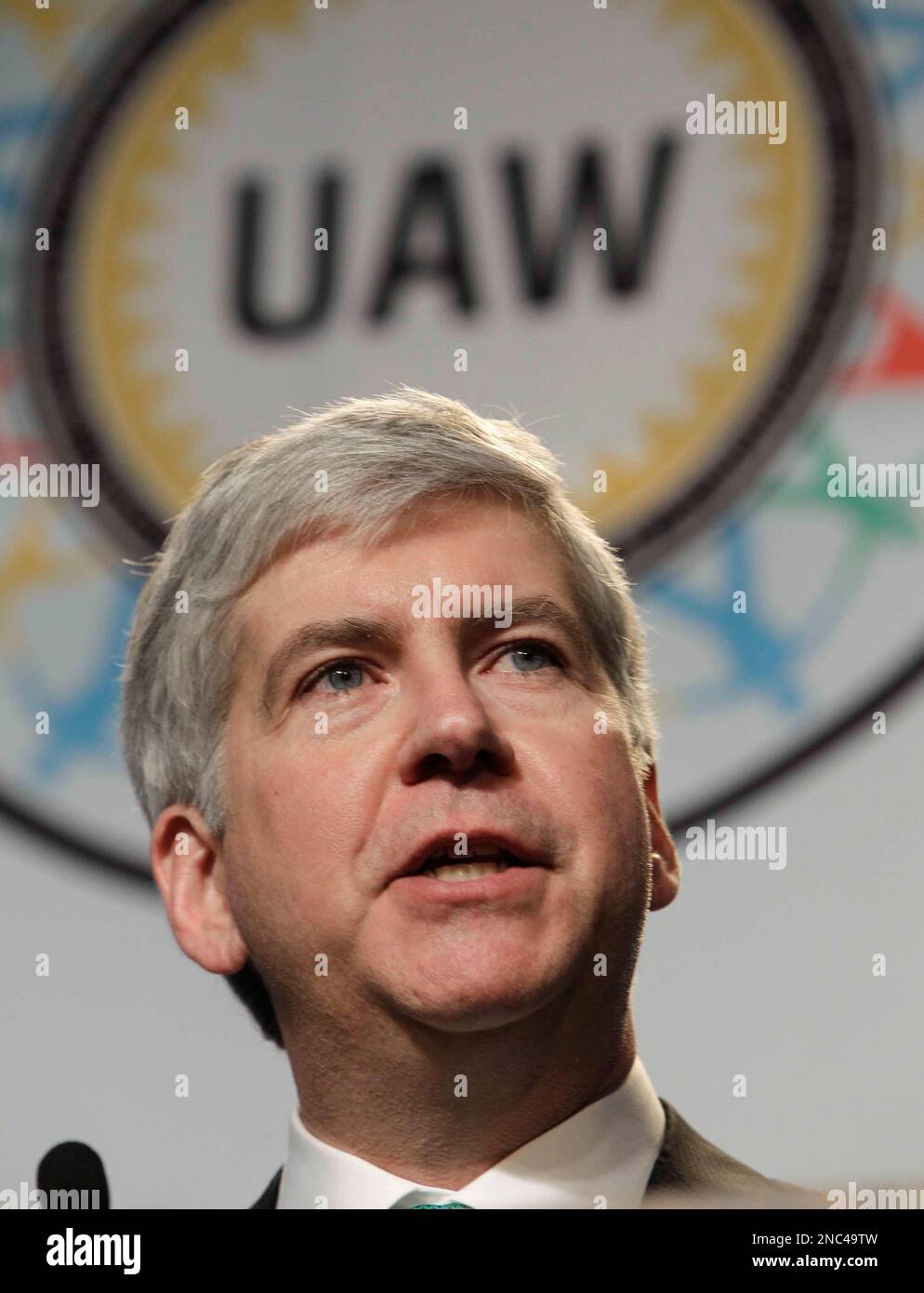 Michigan Gov. Rick Snyder speaks during a launch for the 2012 Ford ...