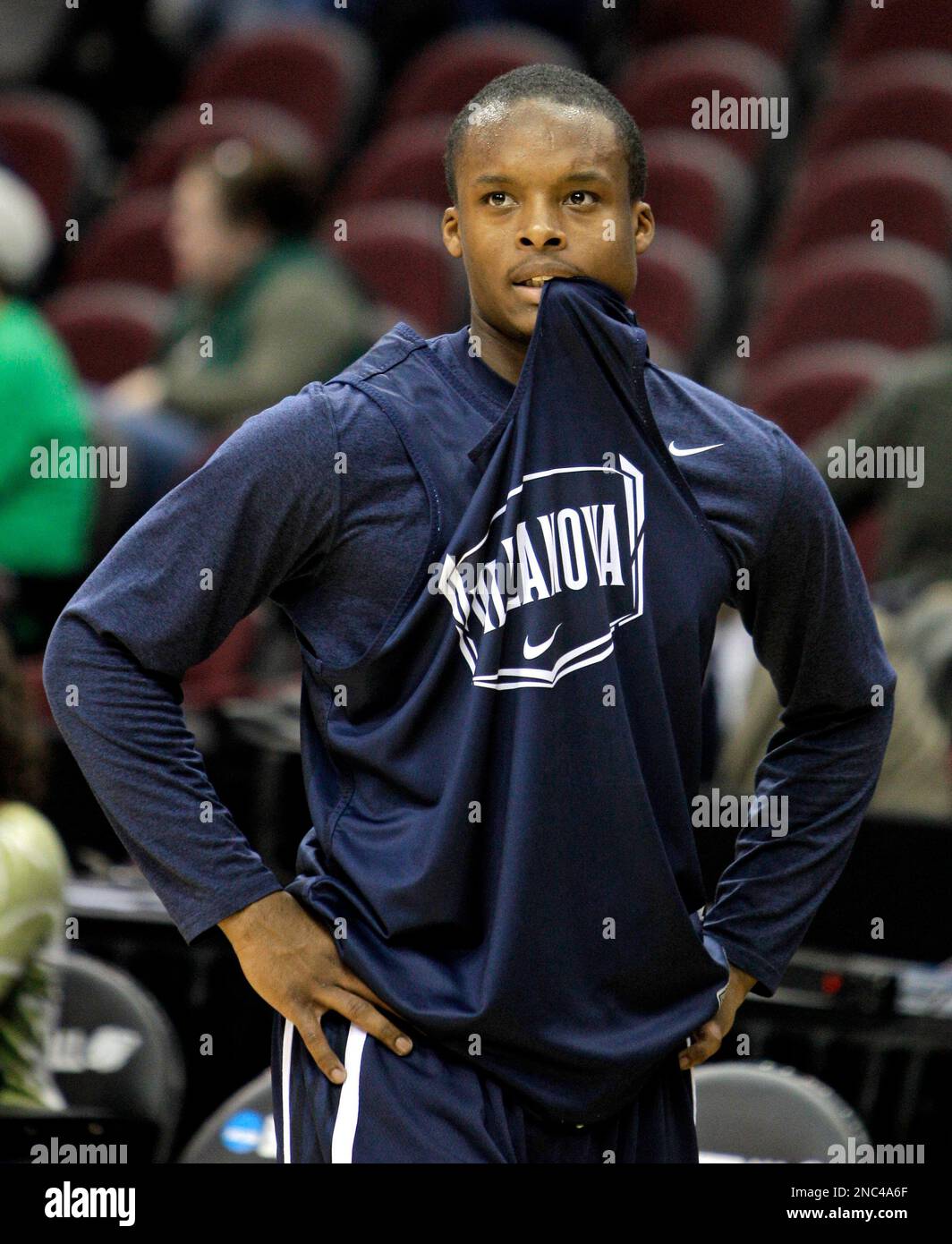 Villanova's Maalik Wayns bites his jersey during practice in the second ...