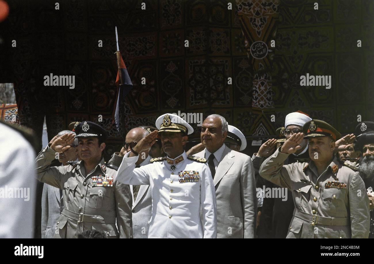 Egyptian President Anwar Sadat raising Egyptian flag-ceremony in Al Arish, Egypt on May 26, 1979 ...