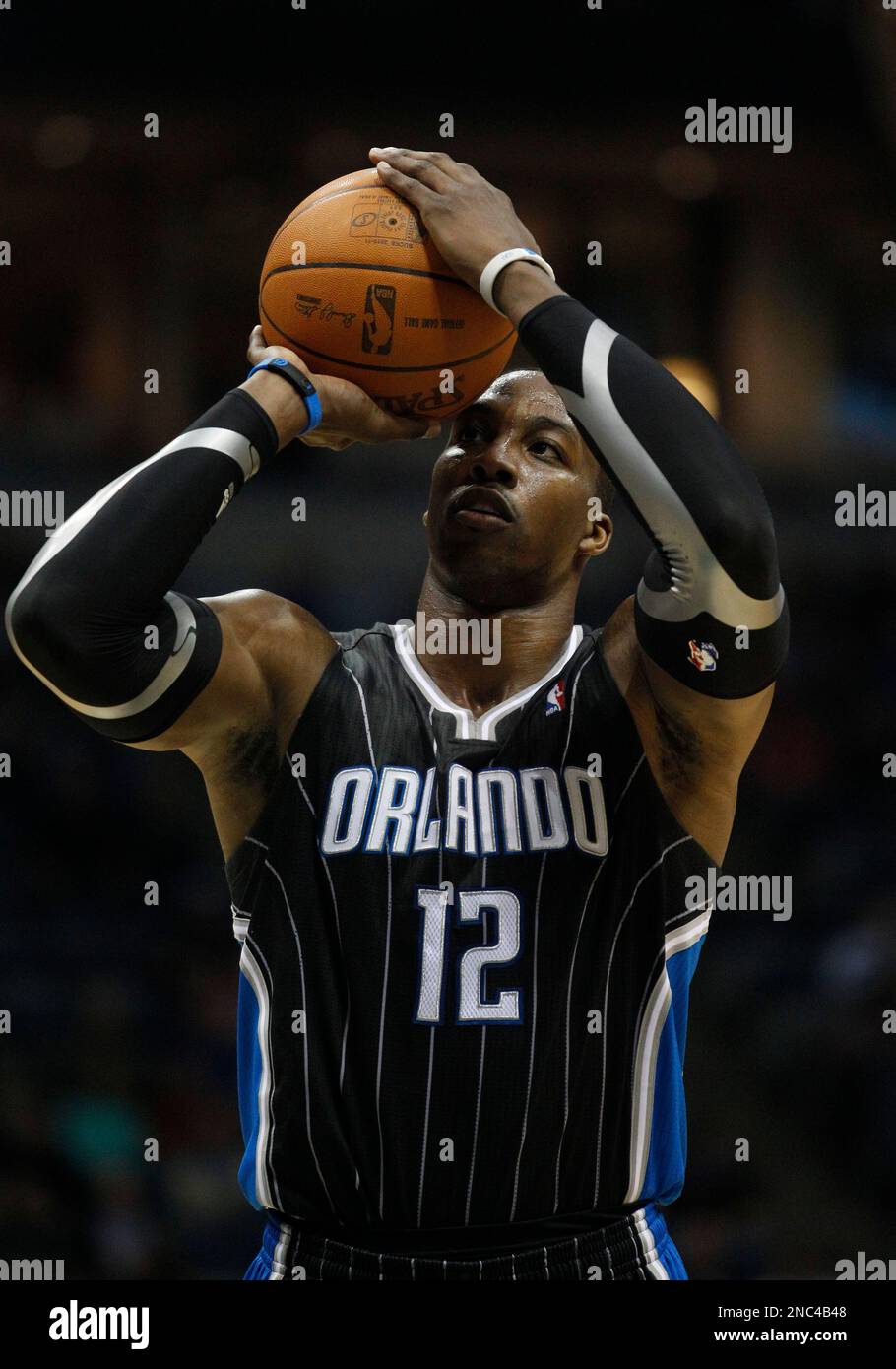 Orlando Magic's Dwight Howard shoots a free throw during the first half ...