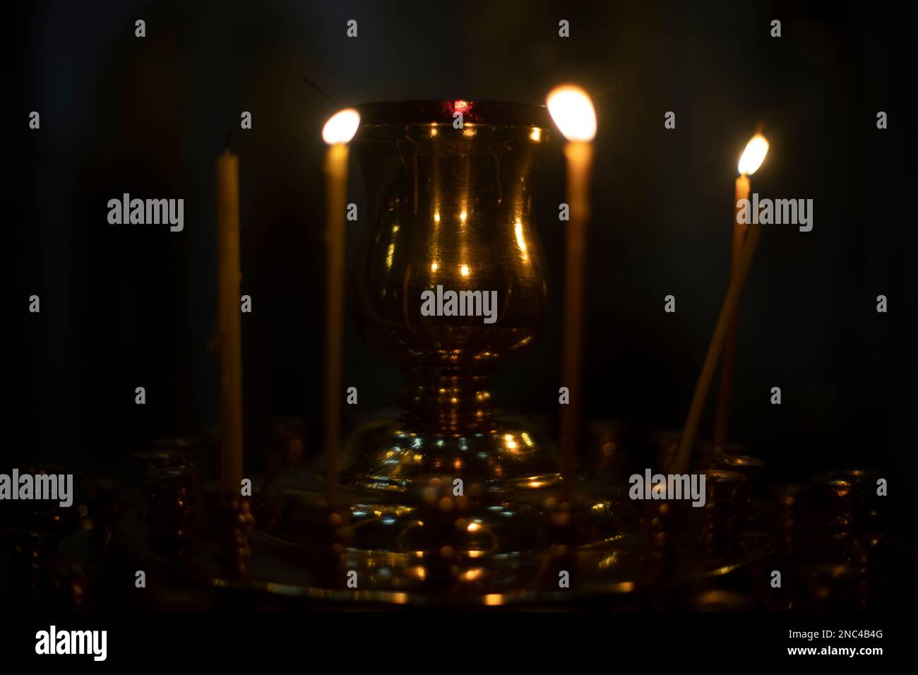 Candles in Temple. Wax candles are burning. Religious rite. Details of ...