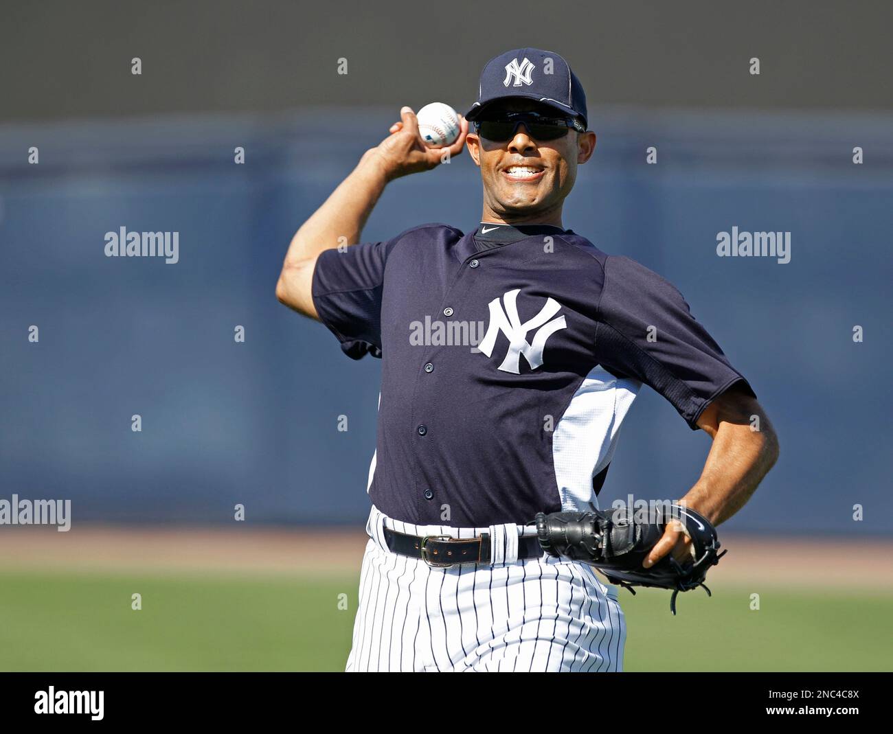 New York Yankees relief pitcher Mariano Rivera throws long toss before ...