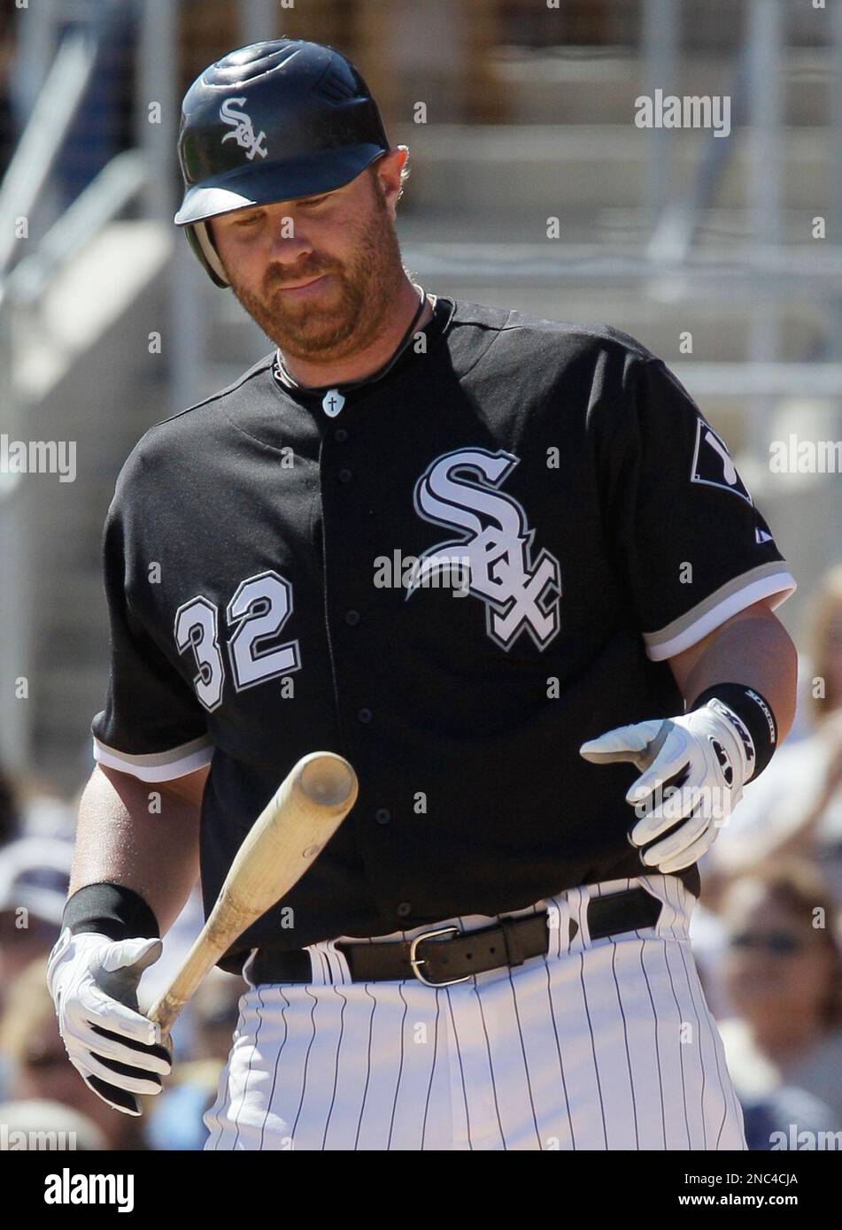 Chicago White Sox's Adam Dunn tosses his bat after striking out during ...